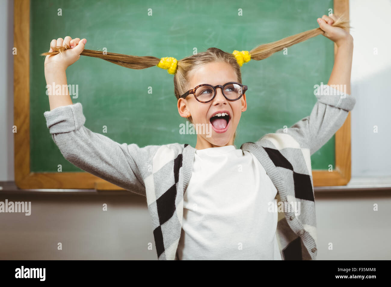 Pulling hair school hi-res stock photography and images - Alamy