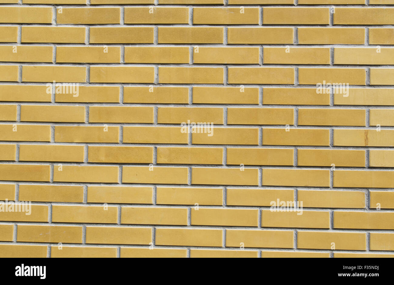 Texture of the yellow brickwork Stock Photo - Alamy