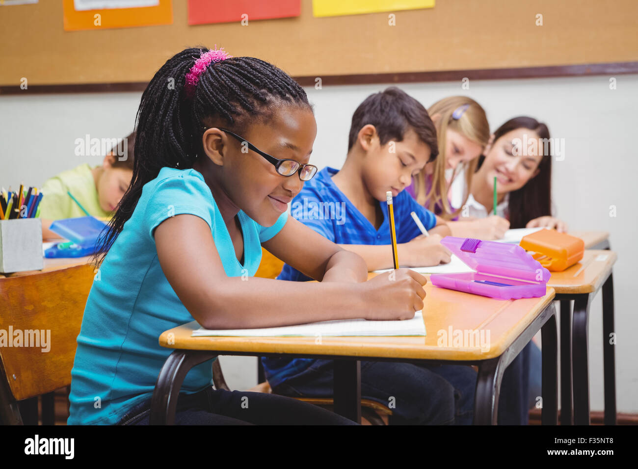 Busy students working on class work Stock Photo - Alamy