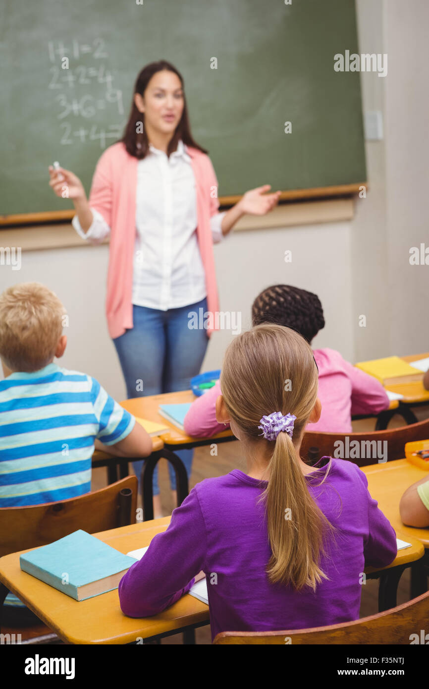 Teacher teaching her classroom of students Stock Photo - Alamy