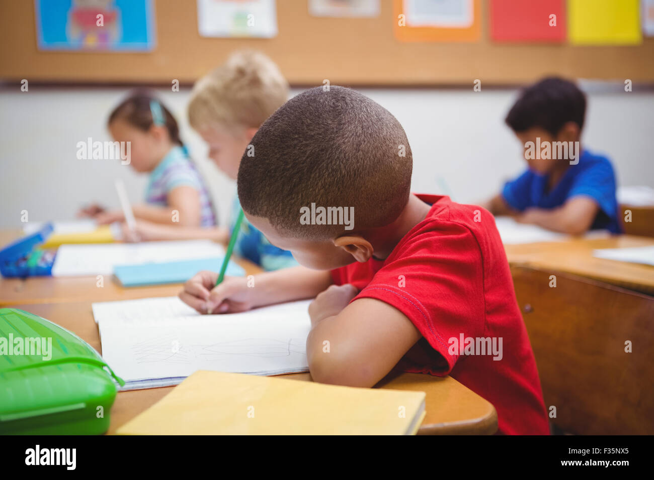 Busy students working on class work Stock Photo - Alamy