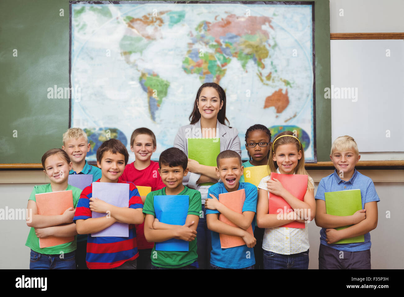 Students cheering in classroom hi-res stock photography and images - Alamy