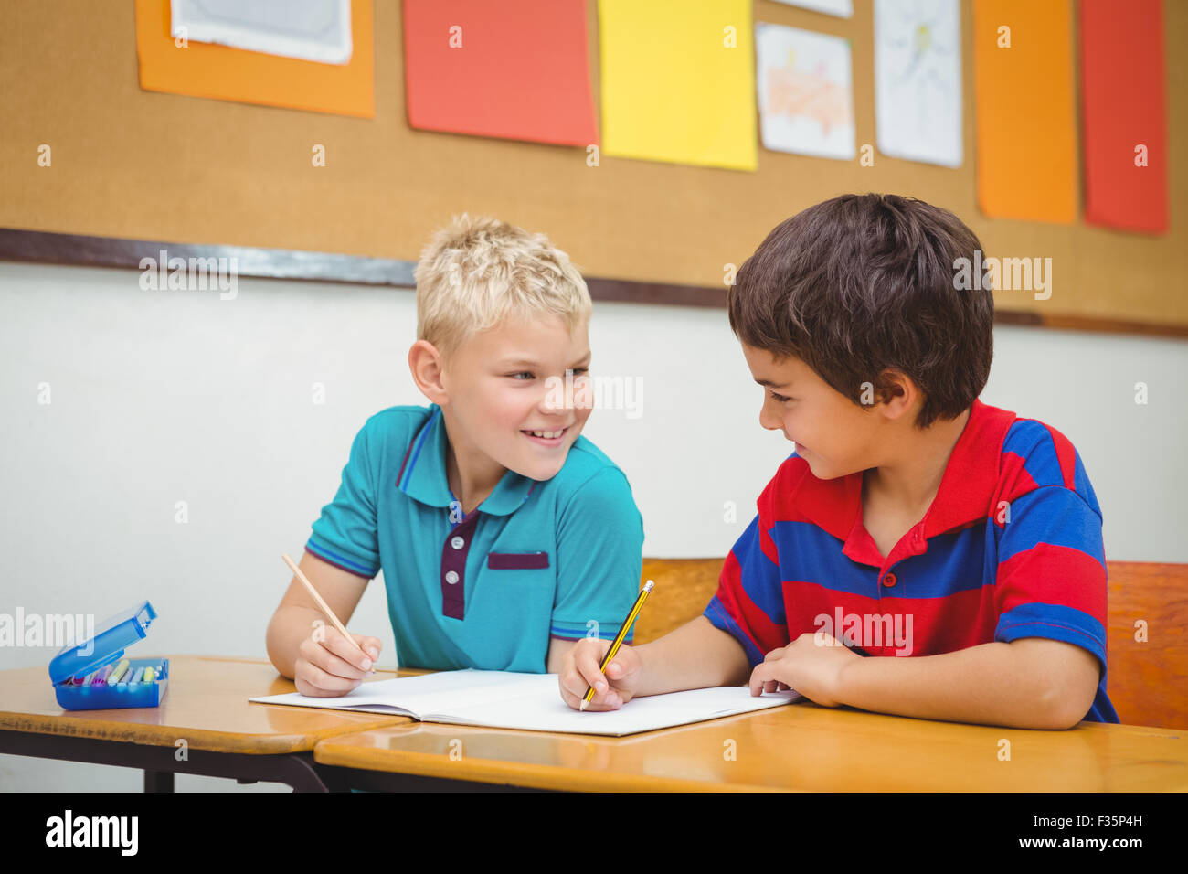 Busy students working on class hi-res stock photography and images - Alamy