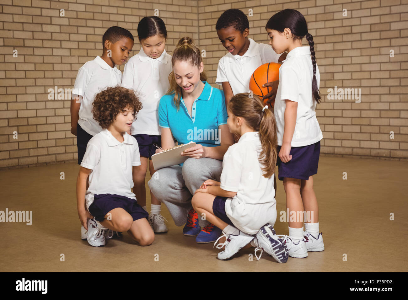 Students preparing to play basketball Stock Photo - Alamy