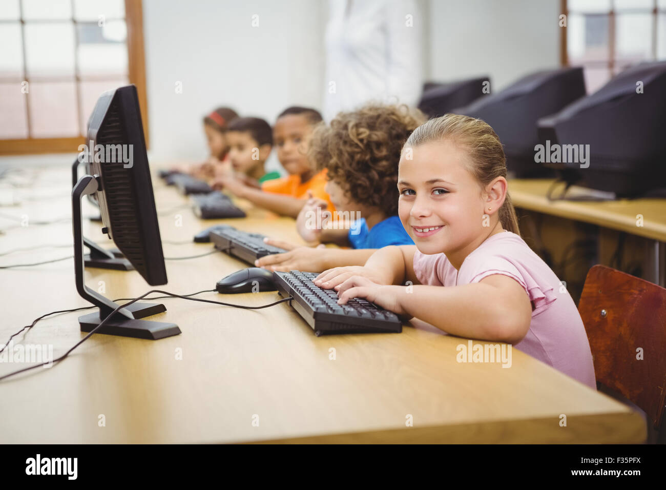 Students using computers in the classroom Stock Photo - Alamy