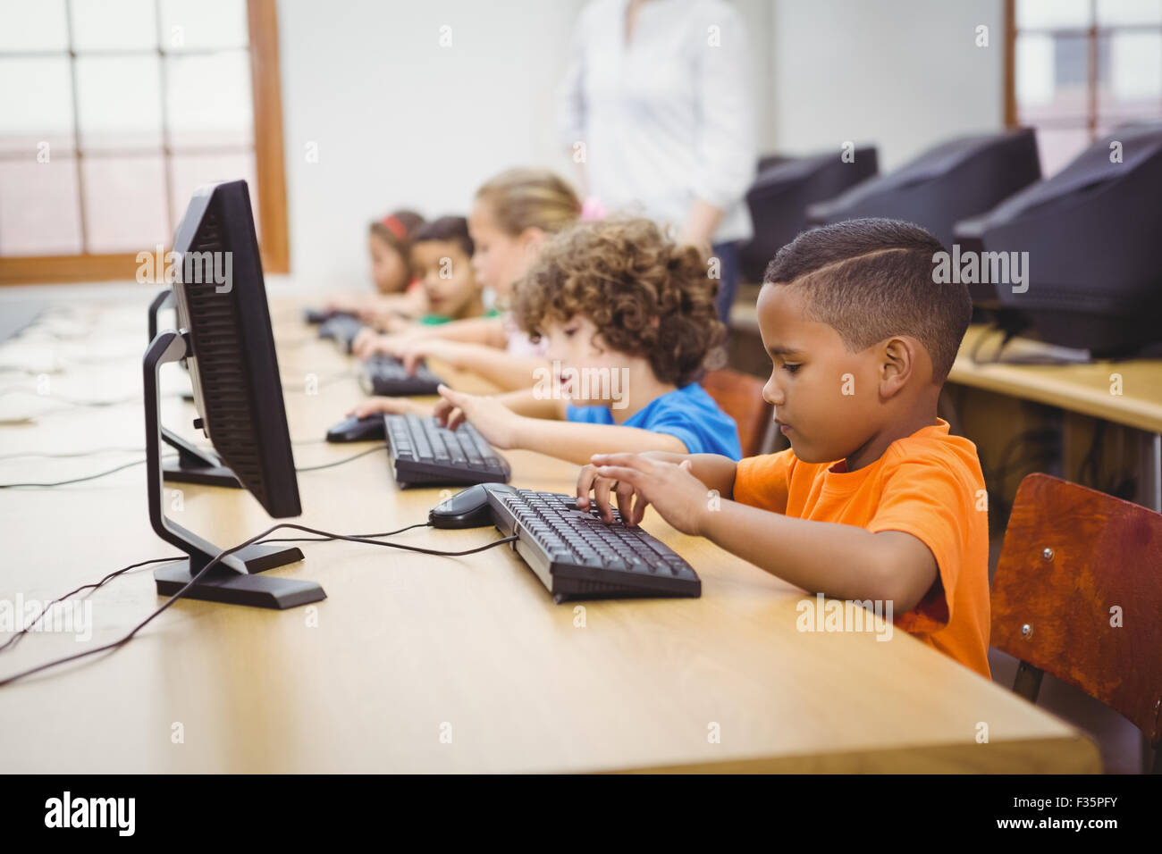 Students using computers in the classroom Stock Photo - Alamy