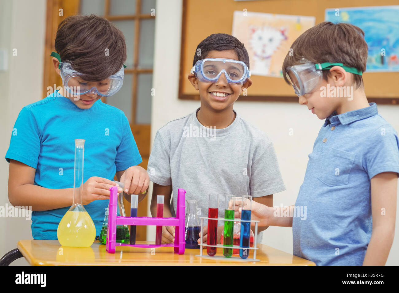 Pupils at science lesson in classroom Stock Photo - Alamy