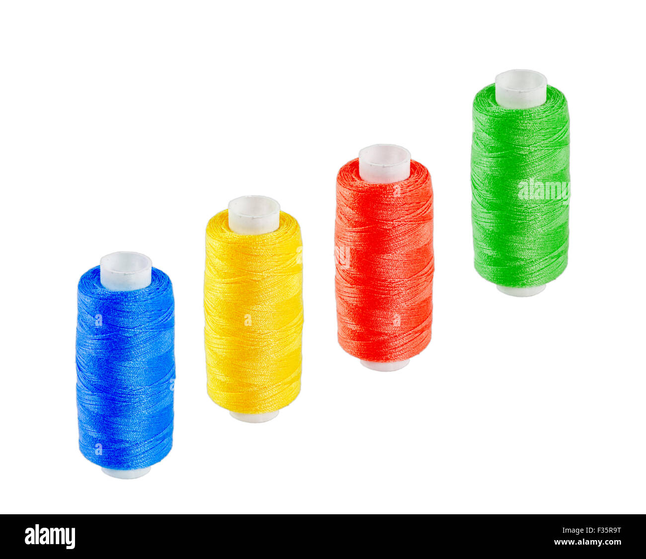 Four multi-colored skeins of thread isolated on white background Stock ...