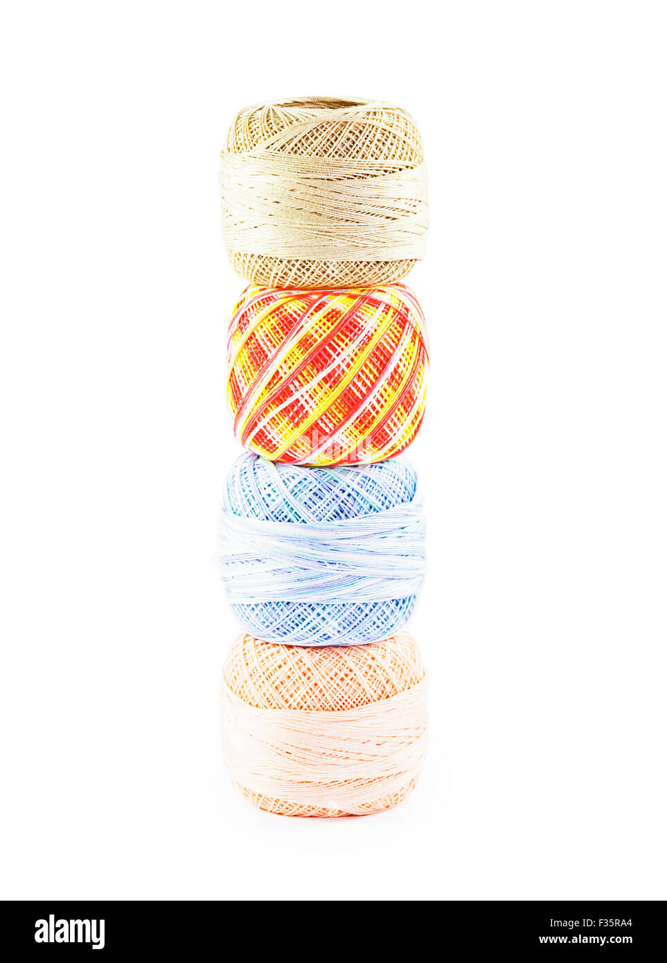 Pyramid of four skeins of yarn isolated on white background Stock Photo ...