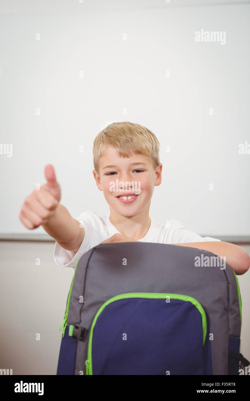 Smiling student giving a thumbs up Stock Photo - Alamy