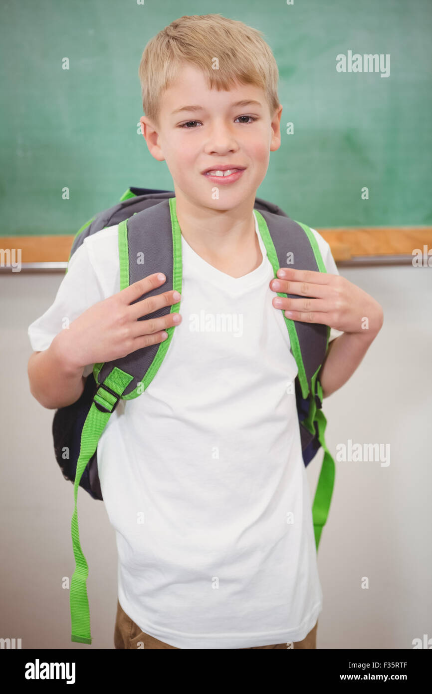 Smiling student wearing a school bag Stock Photo - Alamy
