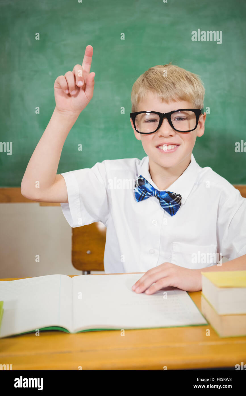 Smart student raising a hand Stock Photo - Alamy