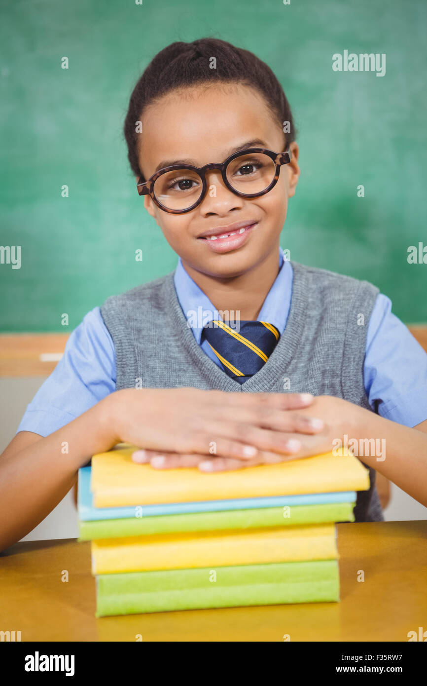 Smiling smart student with books Stock Photo - Alamy