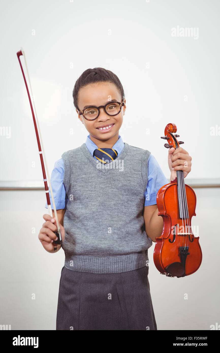 Mixed race student playing violin hi-res stock photography and images ...