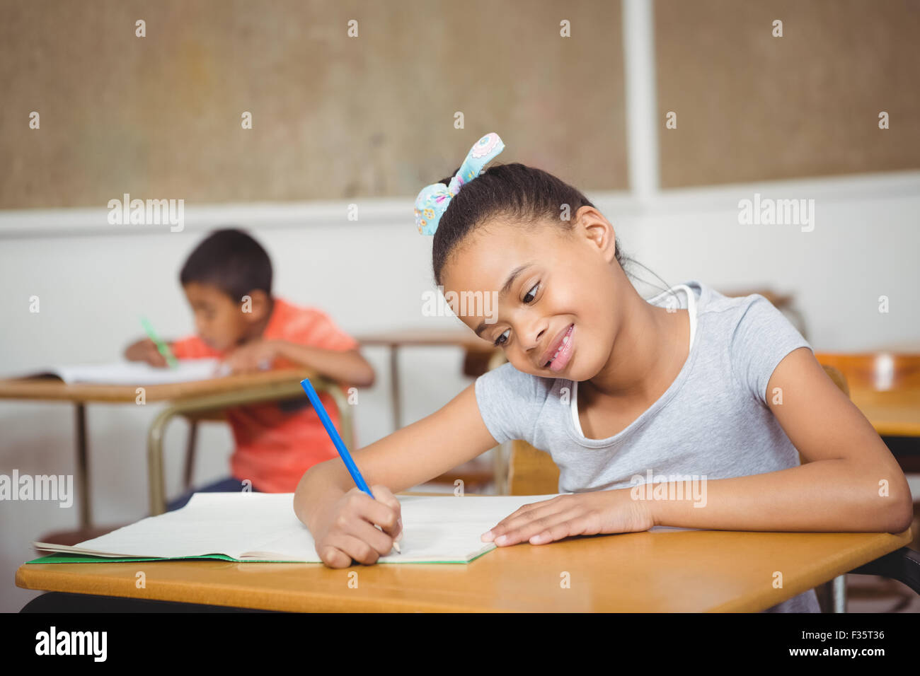 Busy students working on class work Stock Photo - Alamy