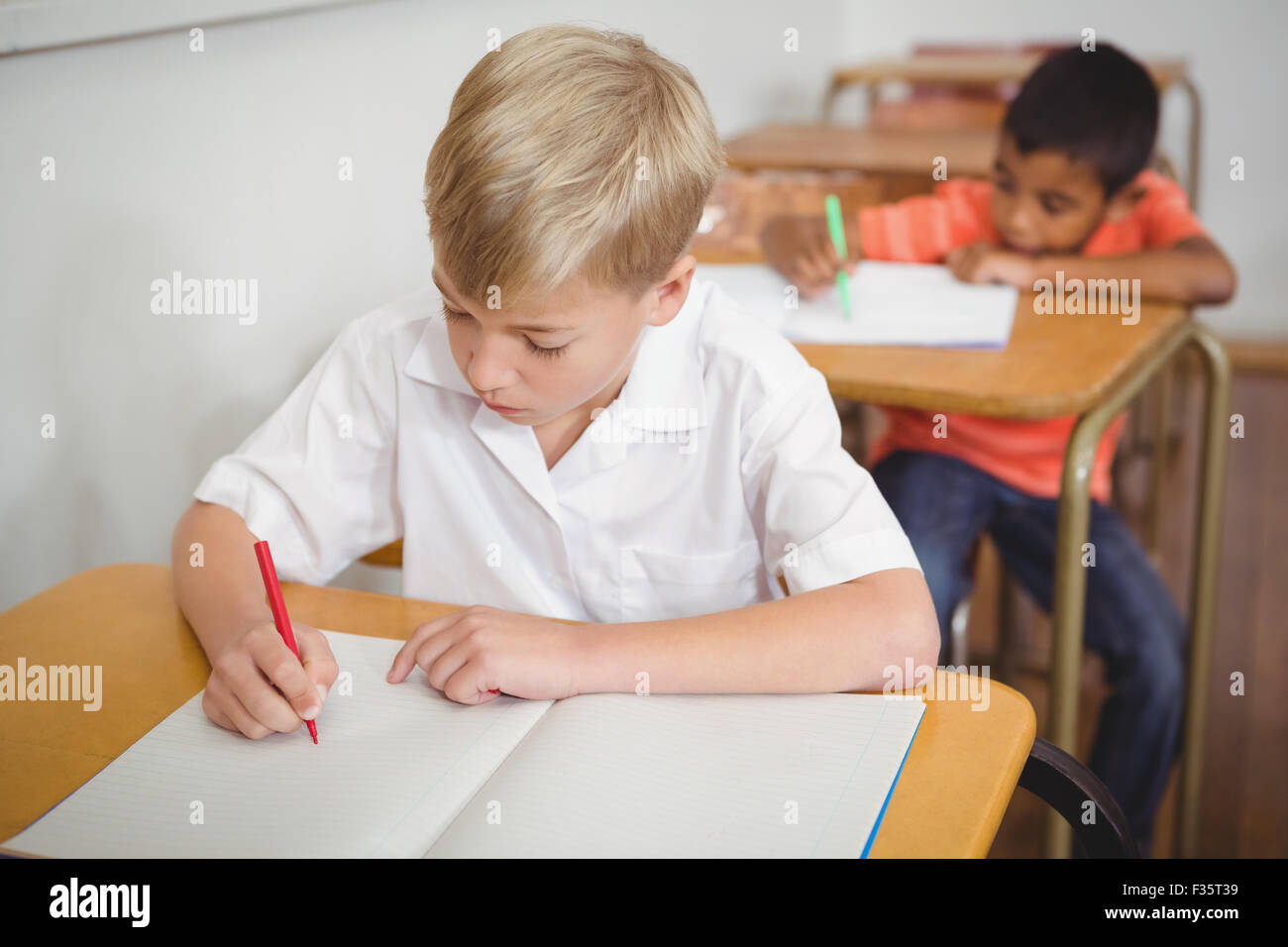 Busy students working on class work Stock Photo - Alamy