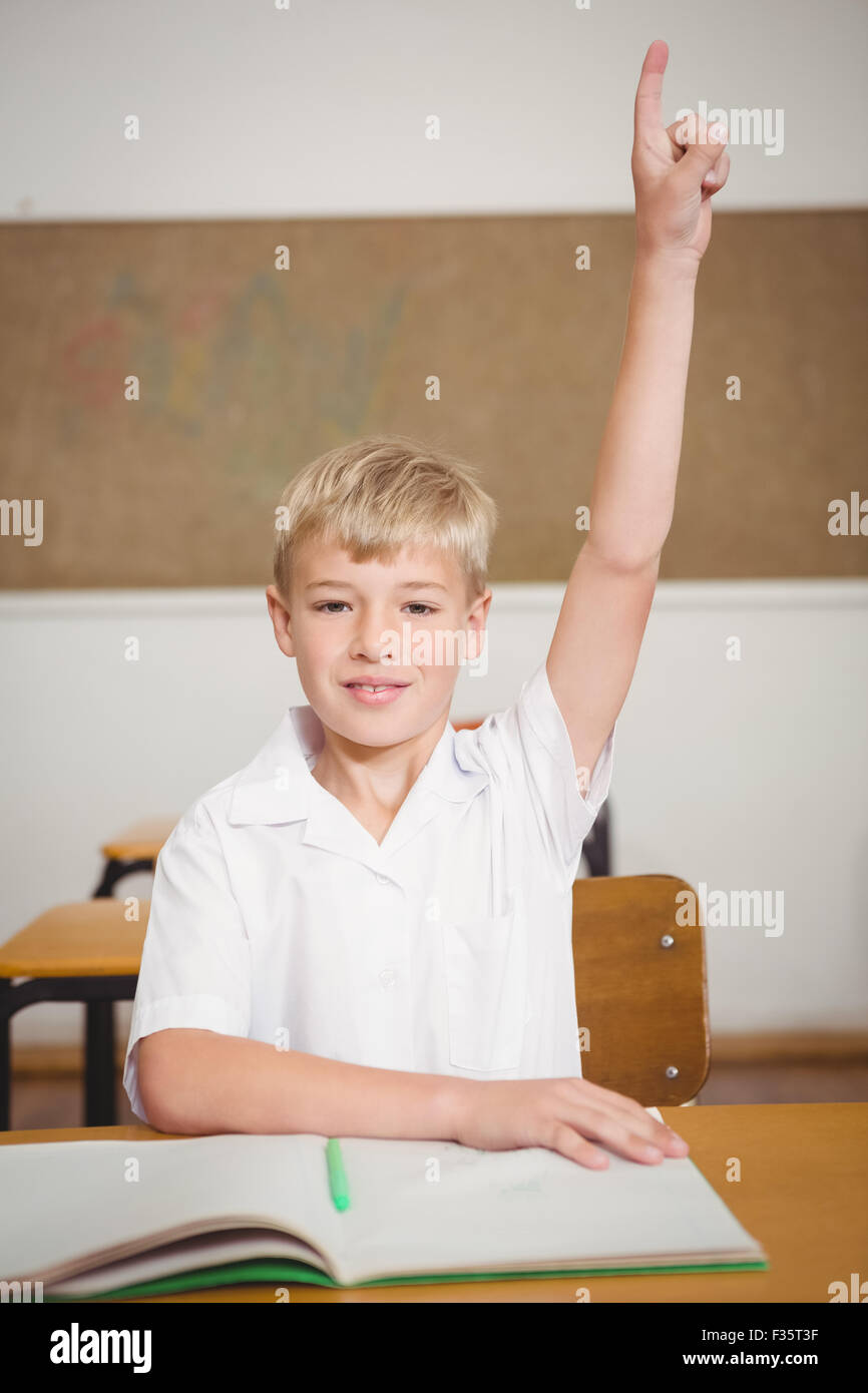 Student raising hand to ask question Stock Photo - Alamy