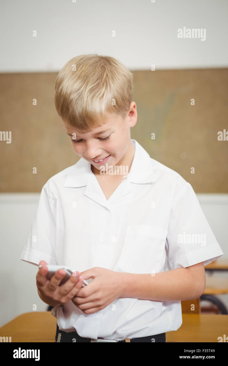 Student using a mobile phone in class Stock Photo - Alamy