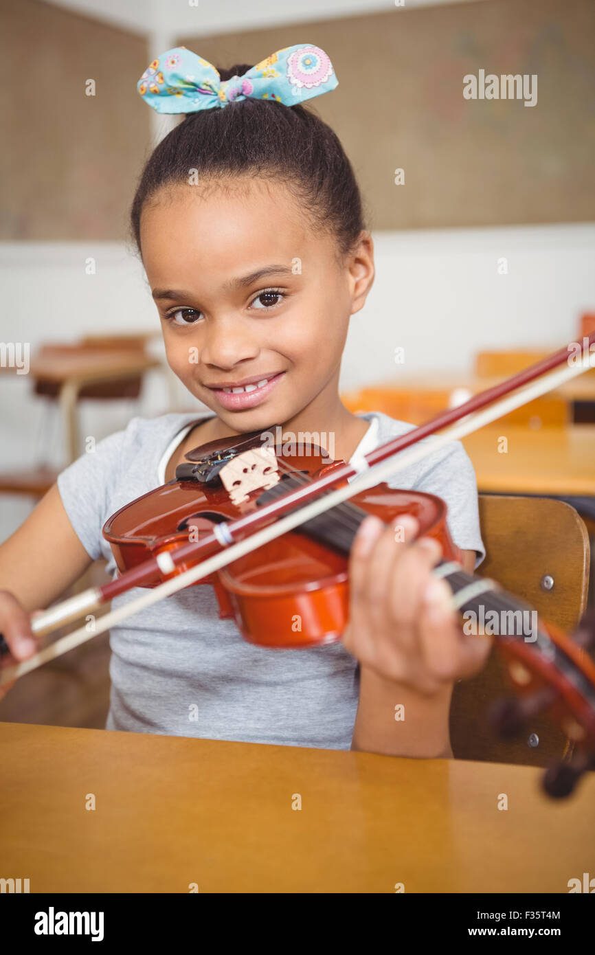 Mixed race student playing violin hi-res stock photography and images ...
