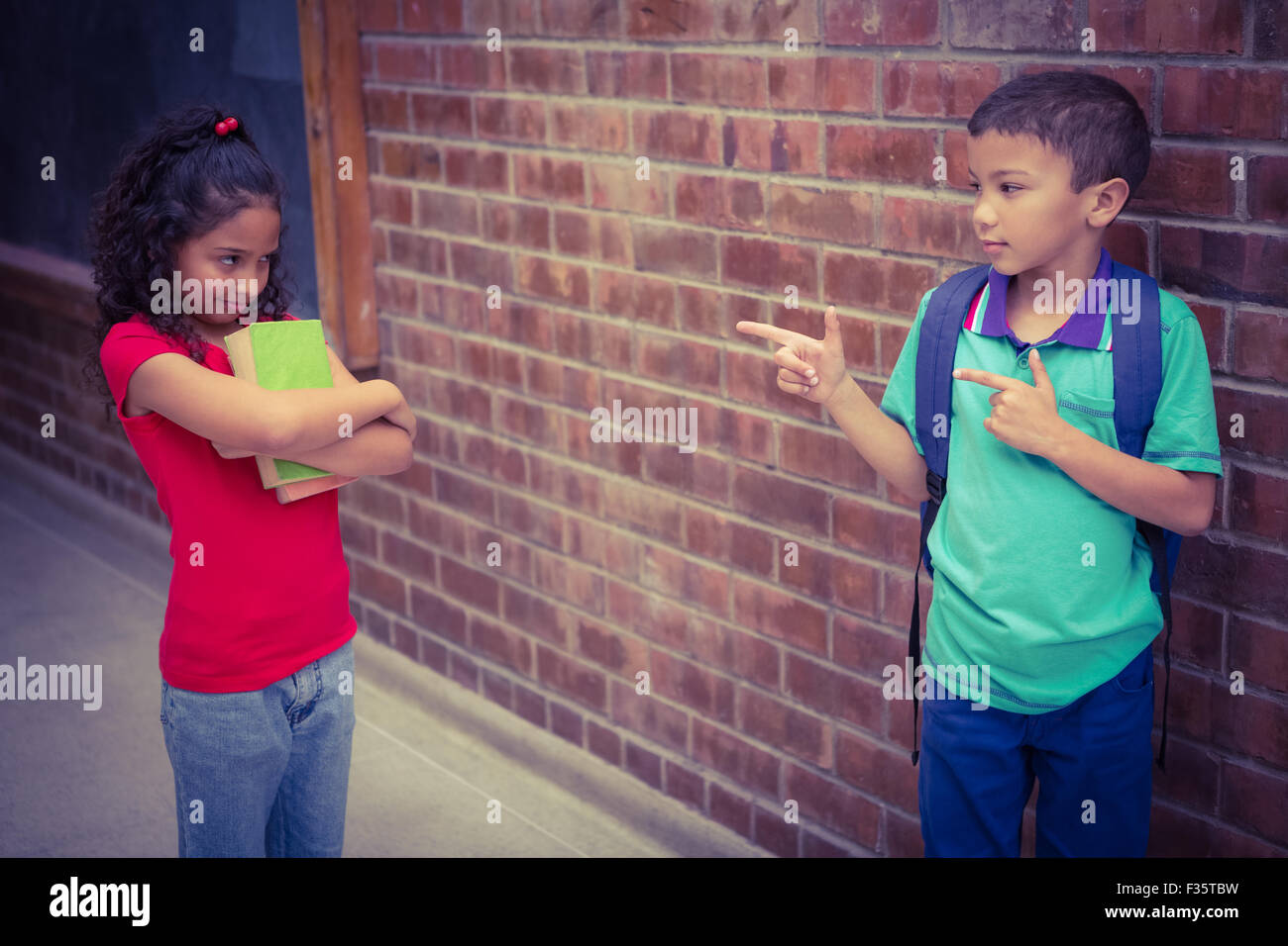 Boy pointing another boy hi-res stock photography and images - Alamy