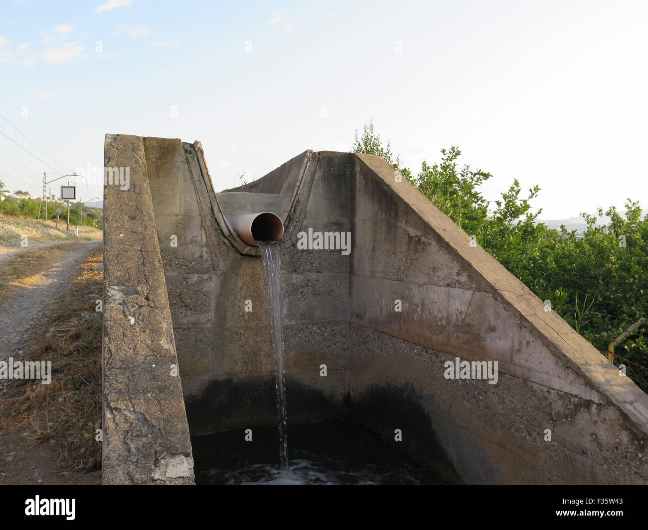 Water flowing through irrigation system in Alora lemon grove Stock ...