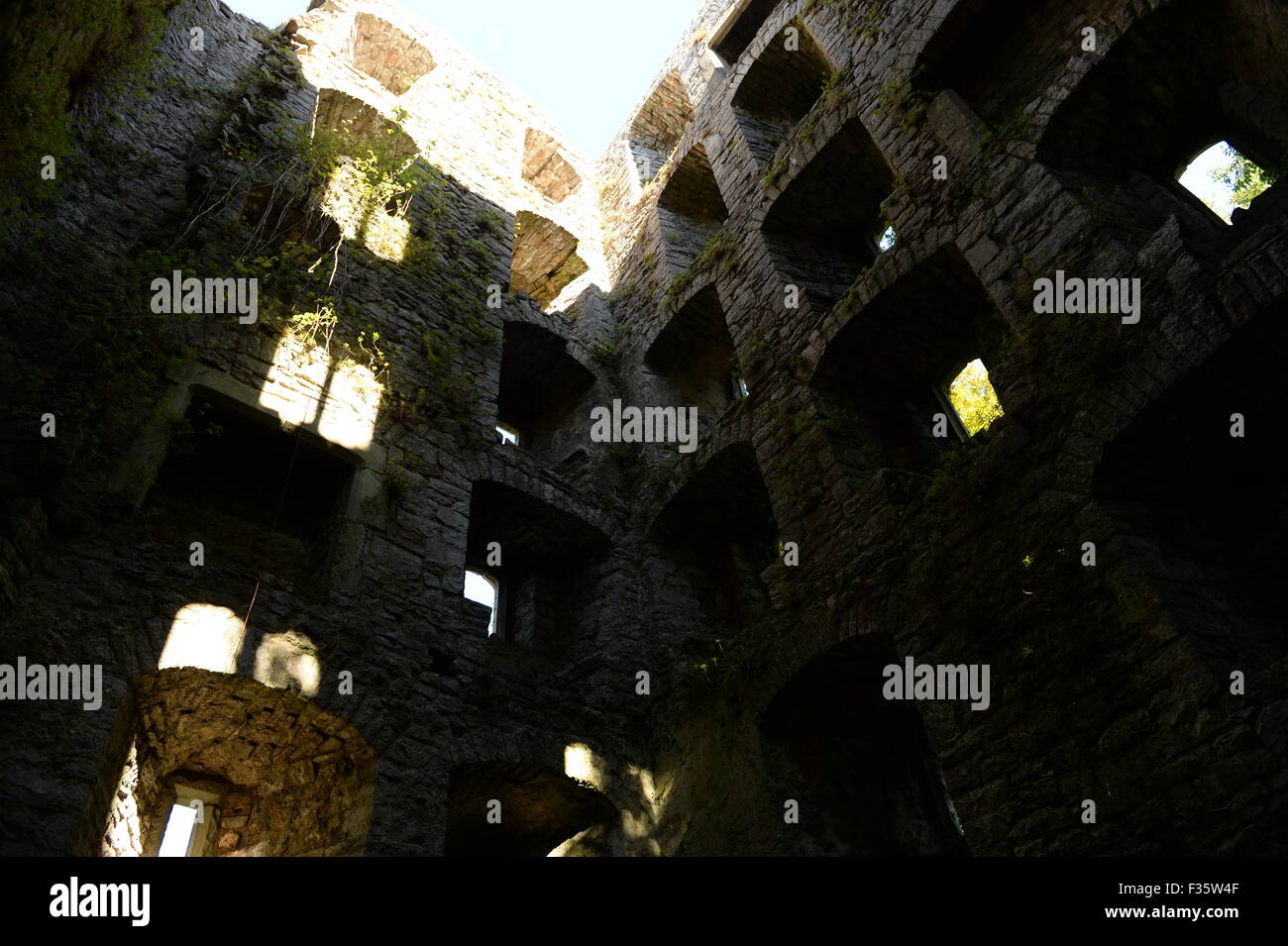 Oxwich castle with its fortified walls extensive windows and Tudor ...
