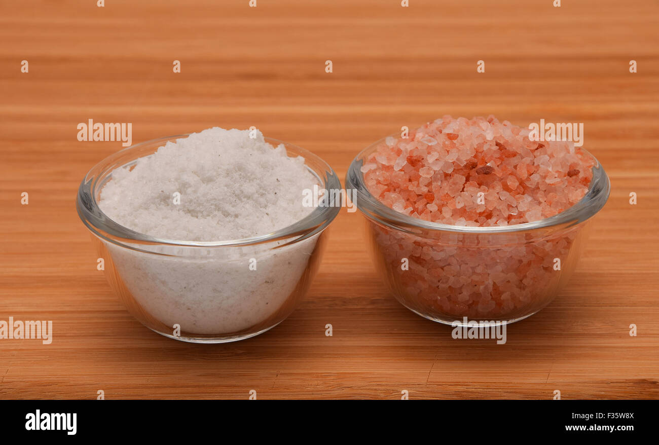 Choose your salt - Himalayan or rock salt (side view) on wooden bamboo ...