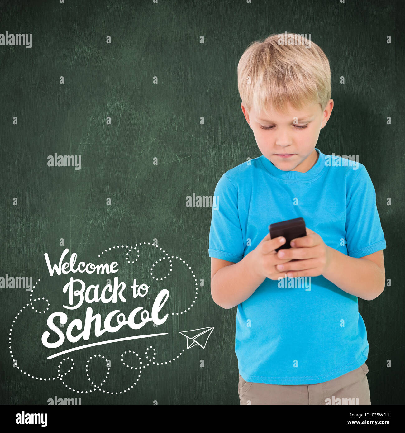 Caucasian school boy using smartphone hi-res stock photography and ...