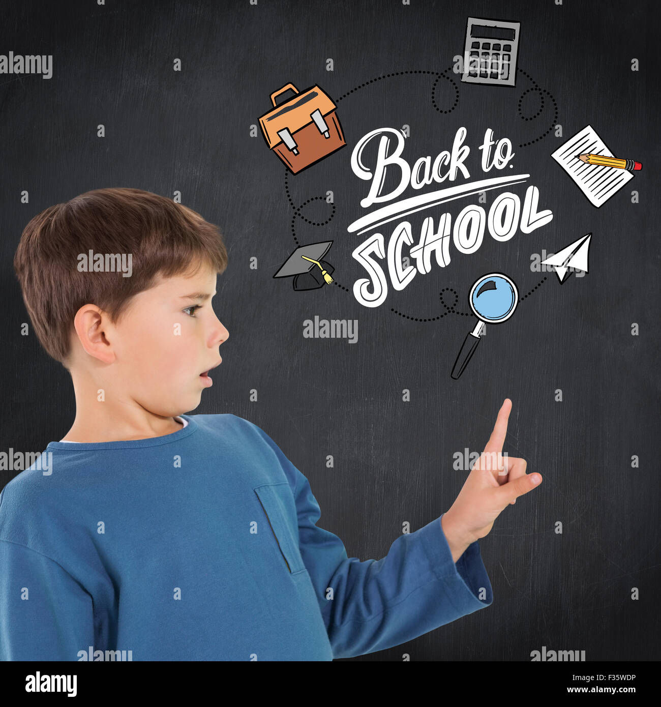 Composite image of cute boy pointing Stock Photo - Alamy