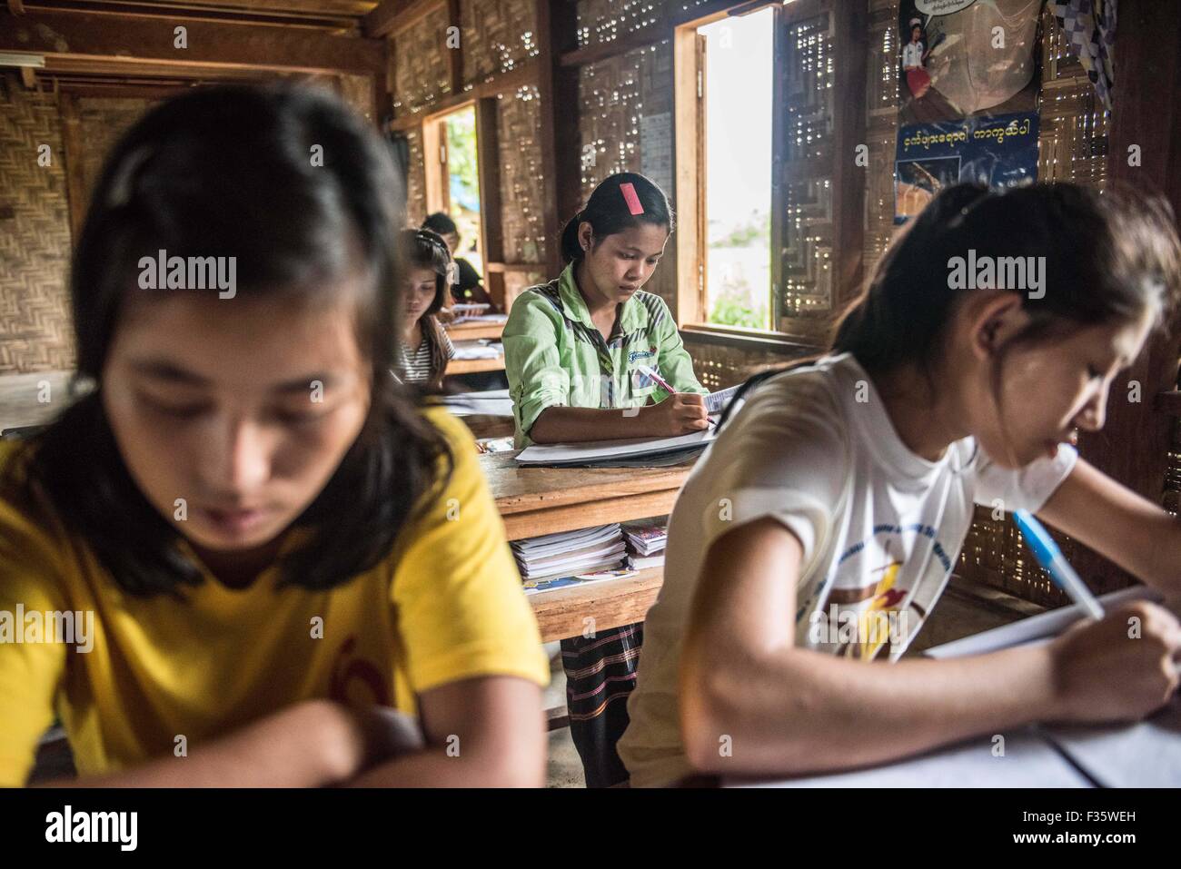 Schoolgirls study at a school in Kachin State, Myanmar Stock Photo - Alamy