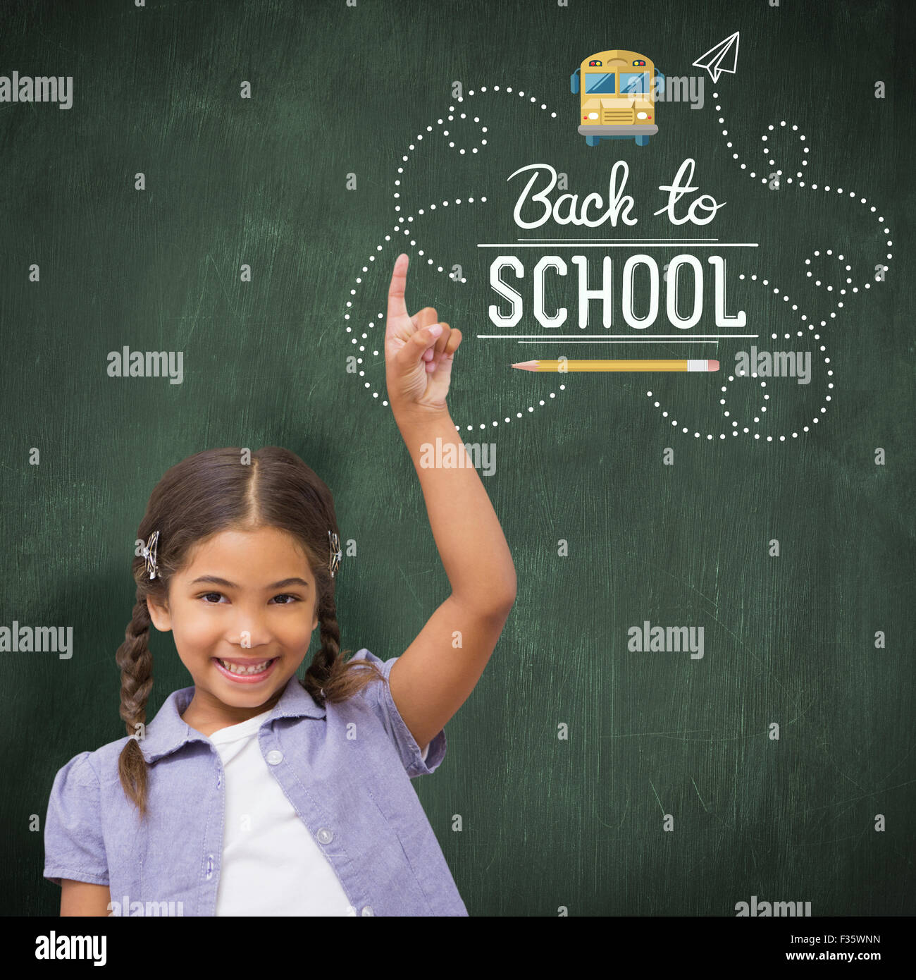 Composite image of happy pupil with arm raised Stock Photo - Alamy