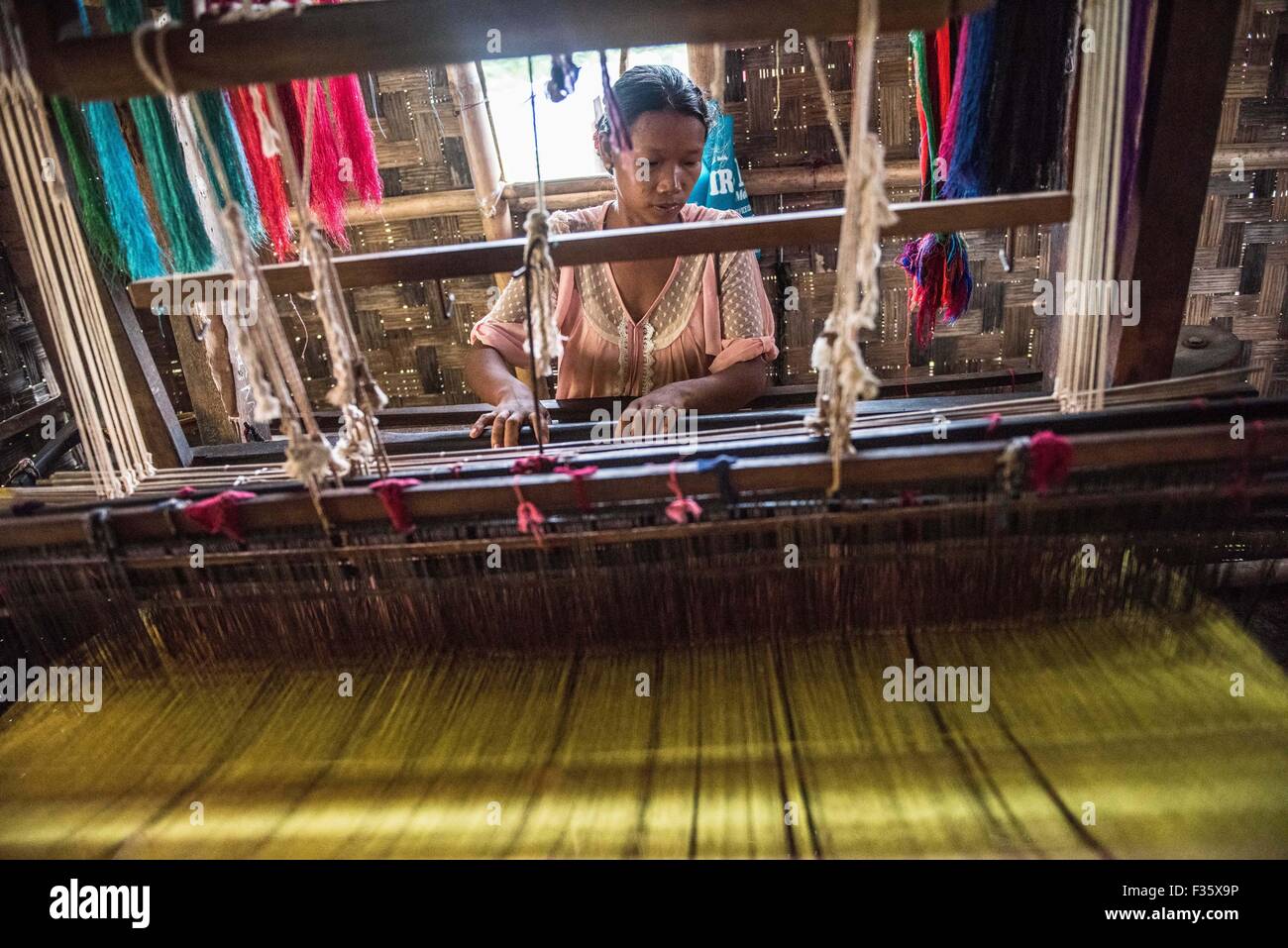 A woman works at a loom in Kachin State, Myanmar Stock Photo - Alamy
