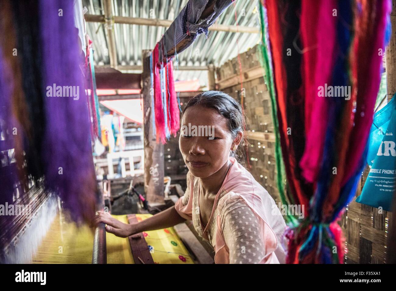 A woman works at a loom in Kachin State, Myanmar Stock Photo - Alamy