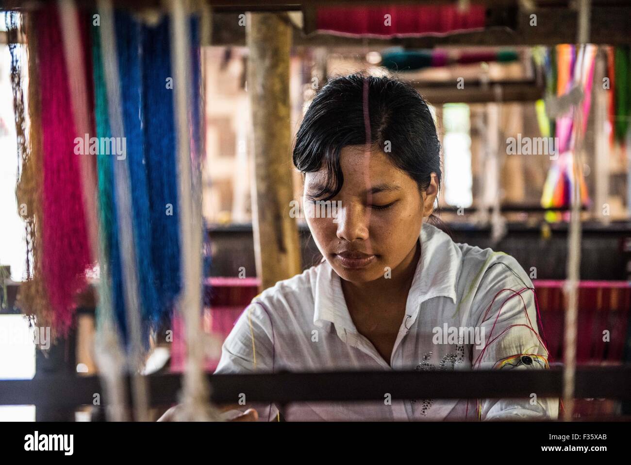 A woman works at a loom in Kachin State, Myanmar Stock Photo - Alamy