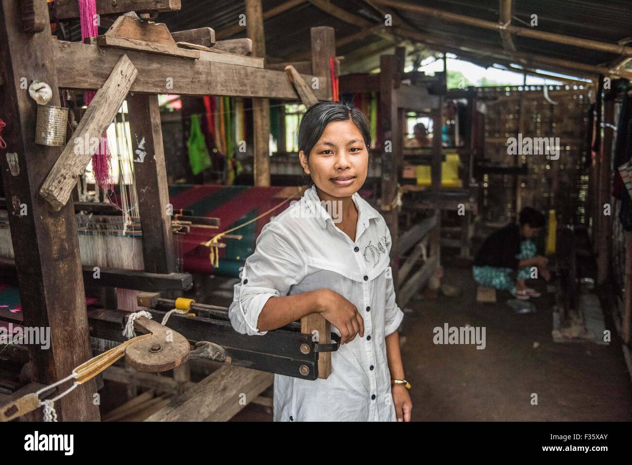 A woman works at a loom in Kachin State, Myanmar Stock Photo - Alamy