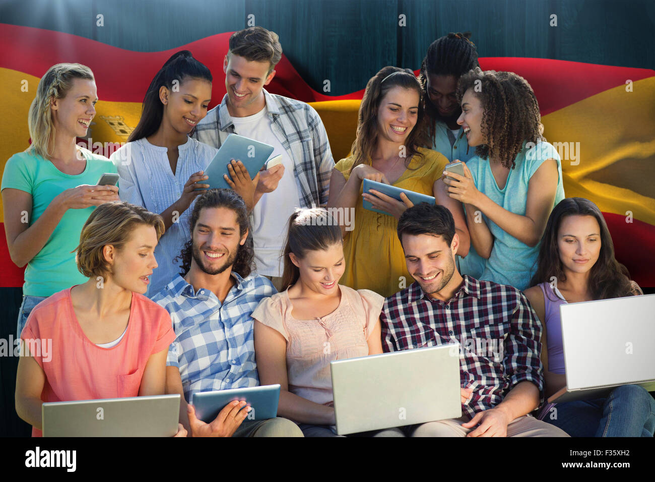 Composite image of several students using electronic devices Stock ...