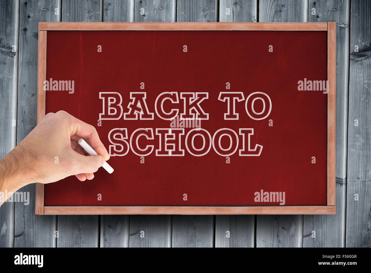 Composite image of hand writing with a white chalk Stock Photo - Alamy