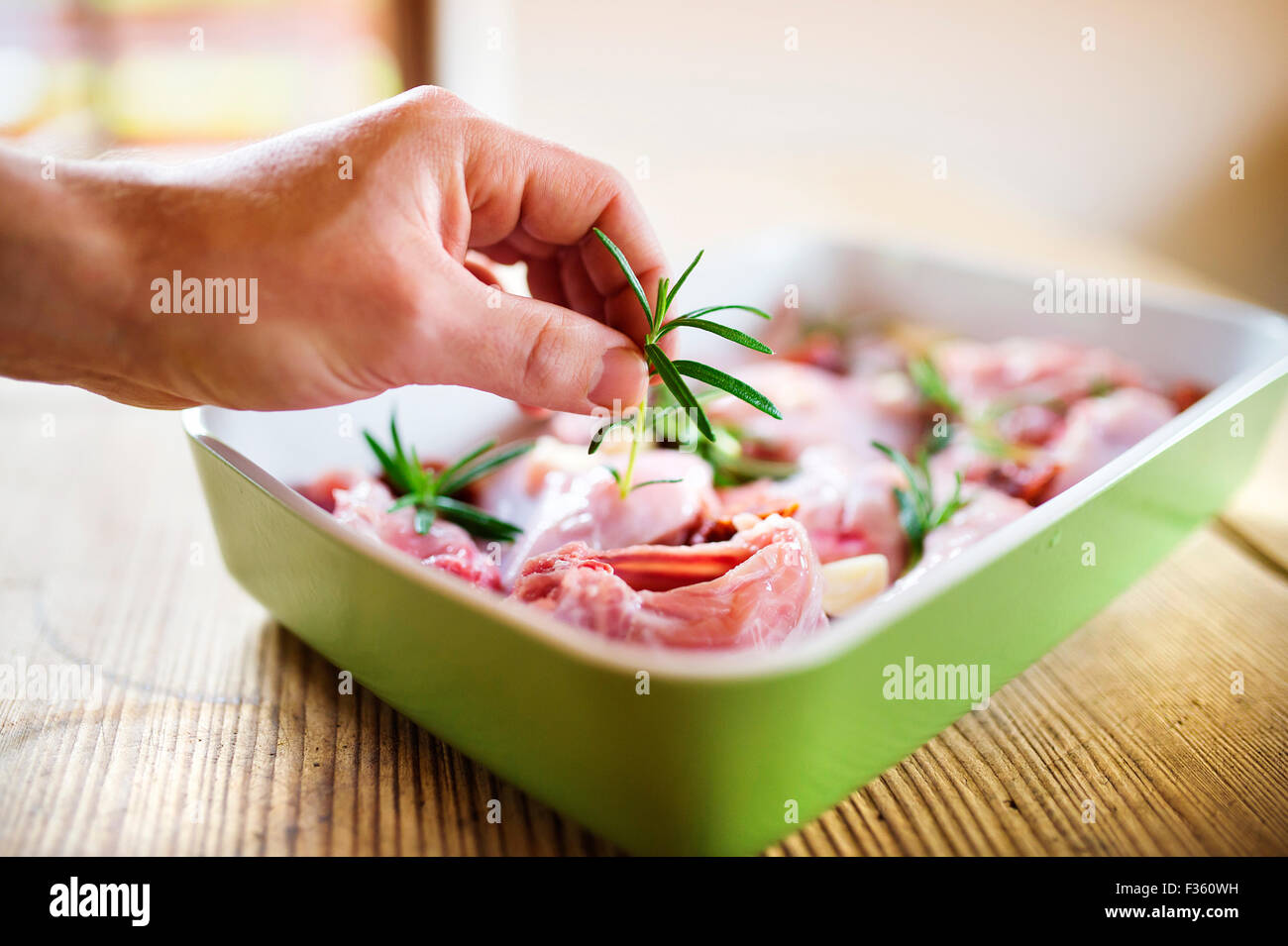Cooking fresh raw rabbit meat Stock Photo - Alamy