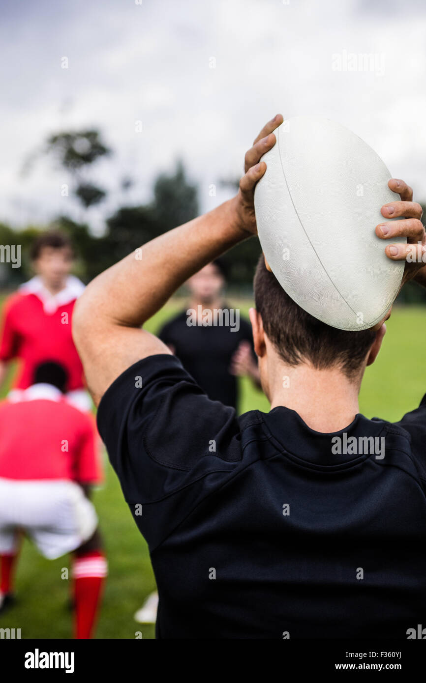 Rugby players training on pitch Stock Photo - Alamy