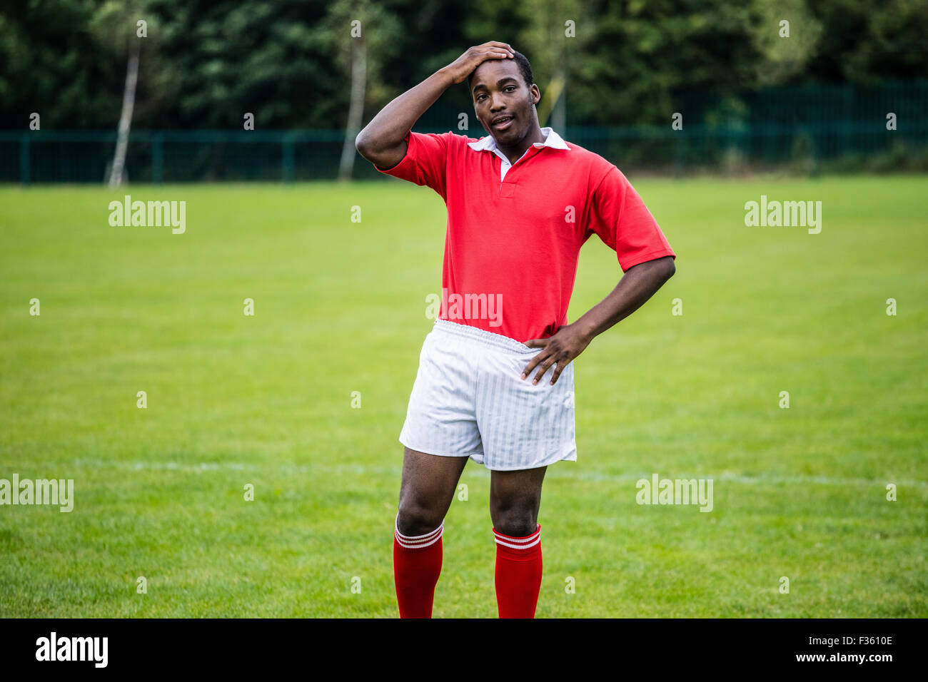 Rugby player taking a break Stock Photo - Alamy