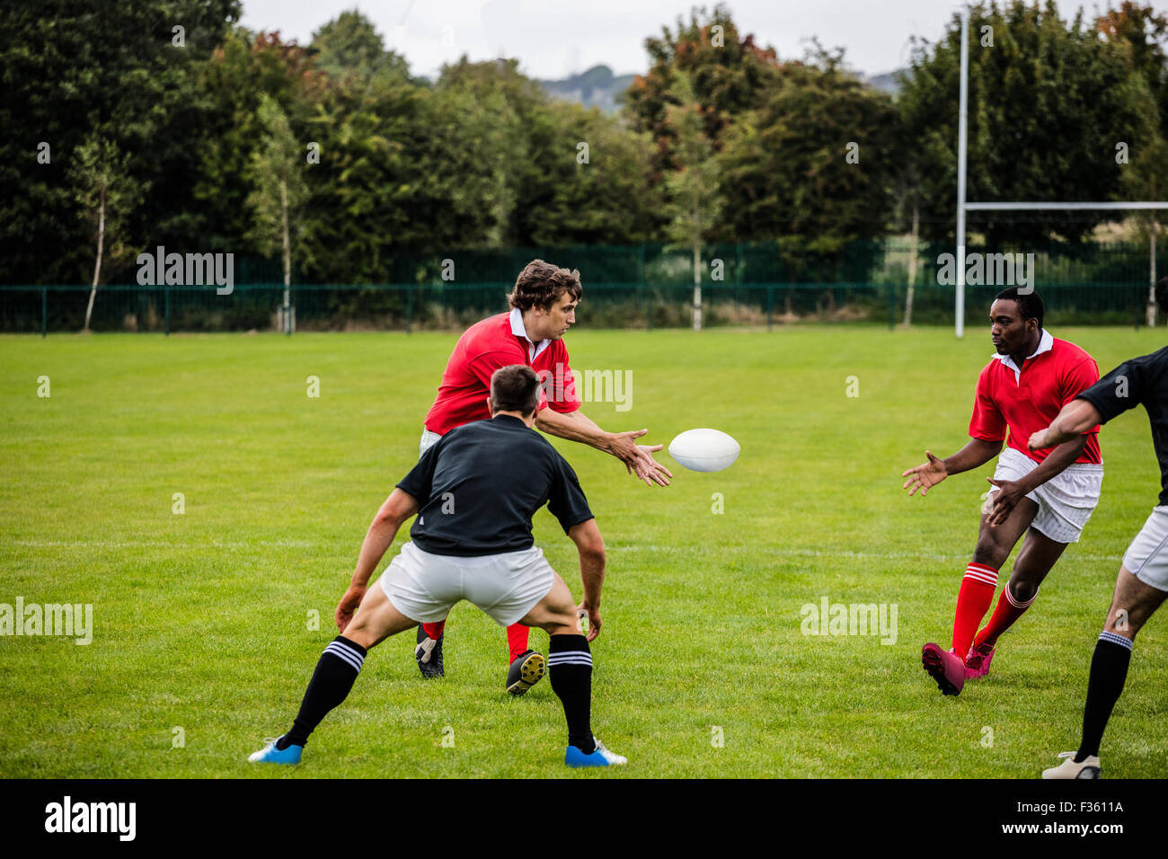 Passing rugby ball hi-res stock photography and images - Alamy