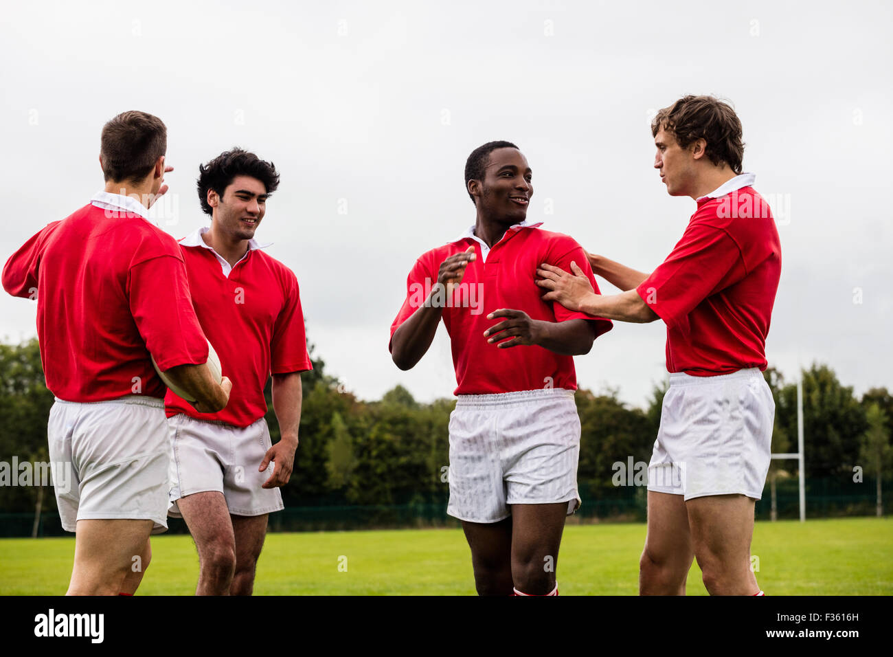 Rugby players celebrating a win Stock Photo - Alamy
