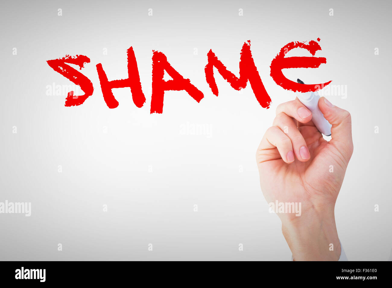 Shame against businessmans hand writing with marker Stock Photo - Alamy