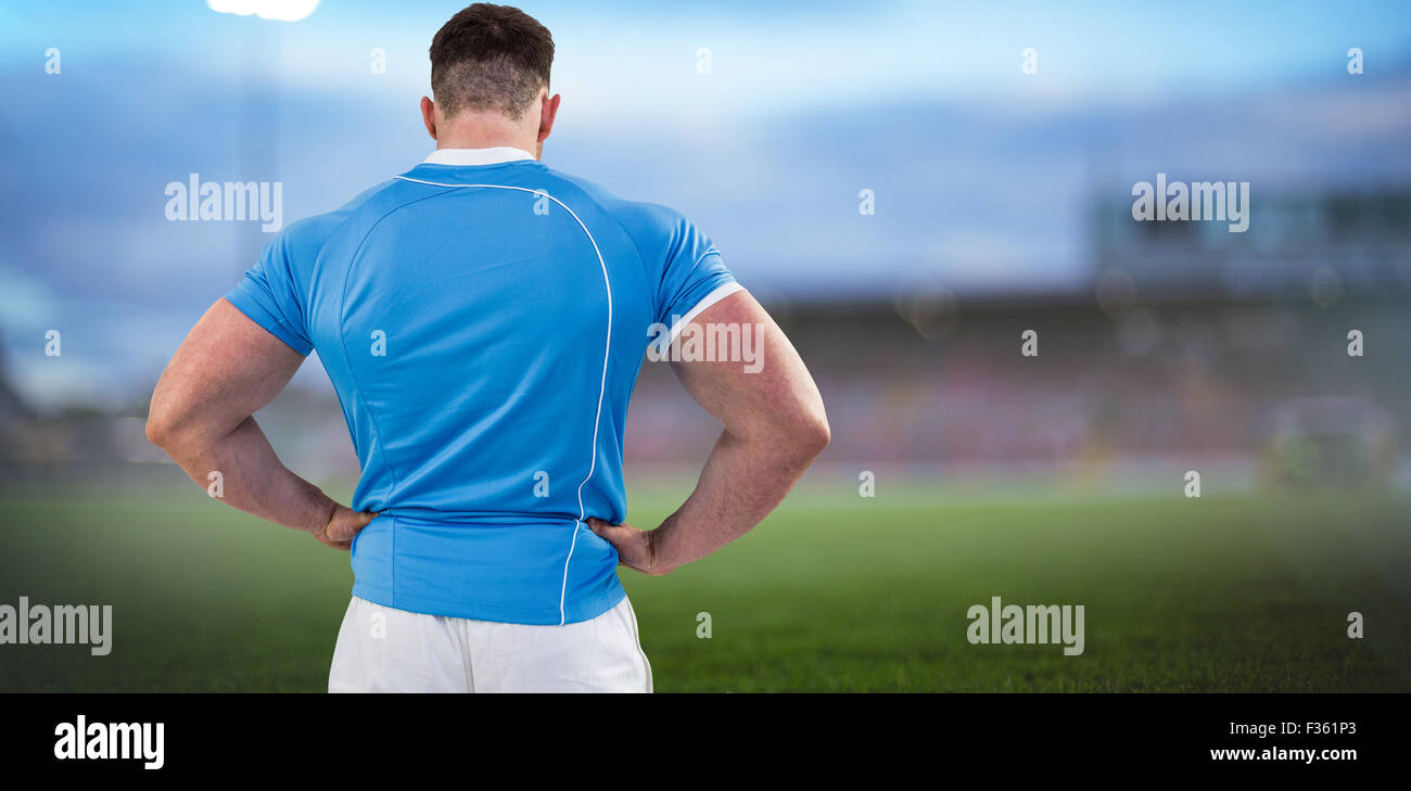 Composite image of rugby player with hands on hips Stock Photo - Alamy