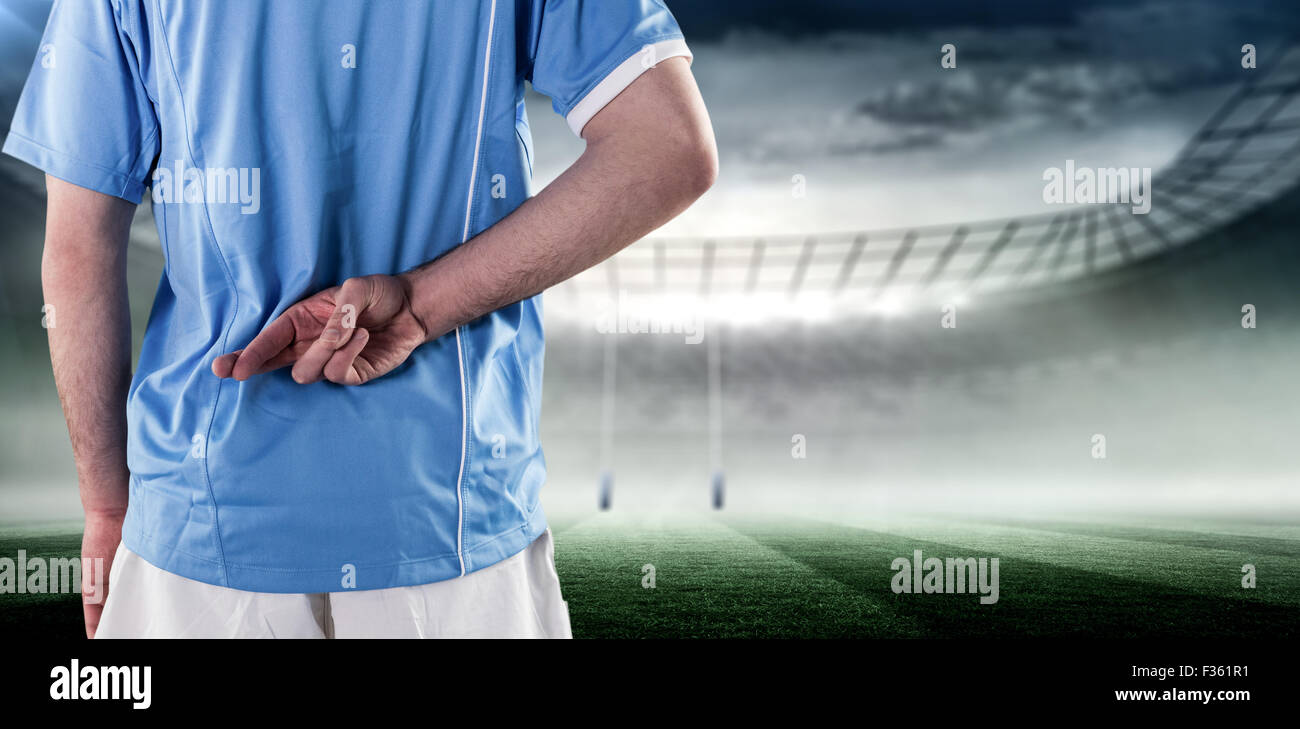 Composite image of rugby player with hands on hips Stock Photo - Alamy