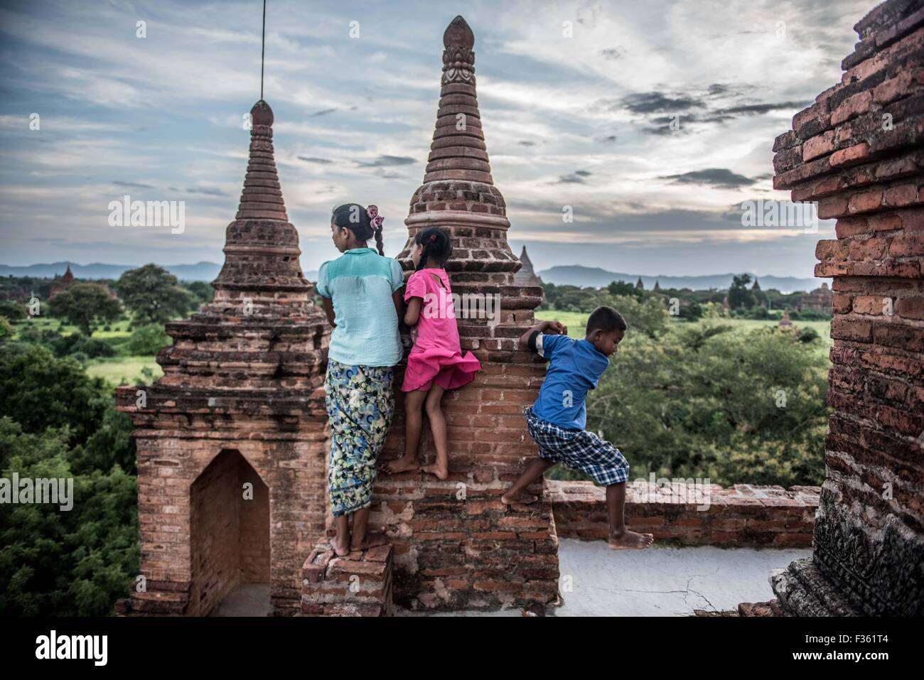 Children play on a temple in Bagan, Myanmar Stock Photo - Alamy