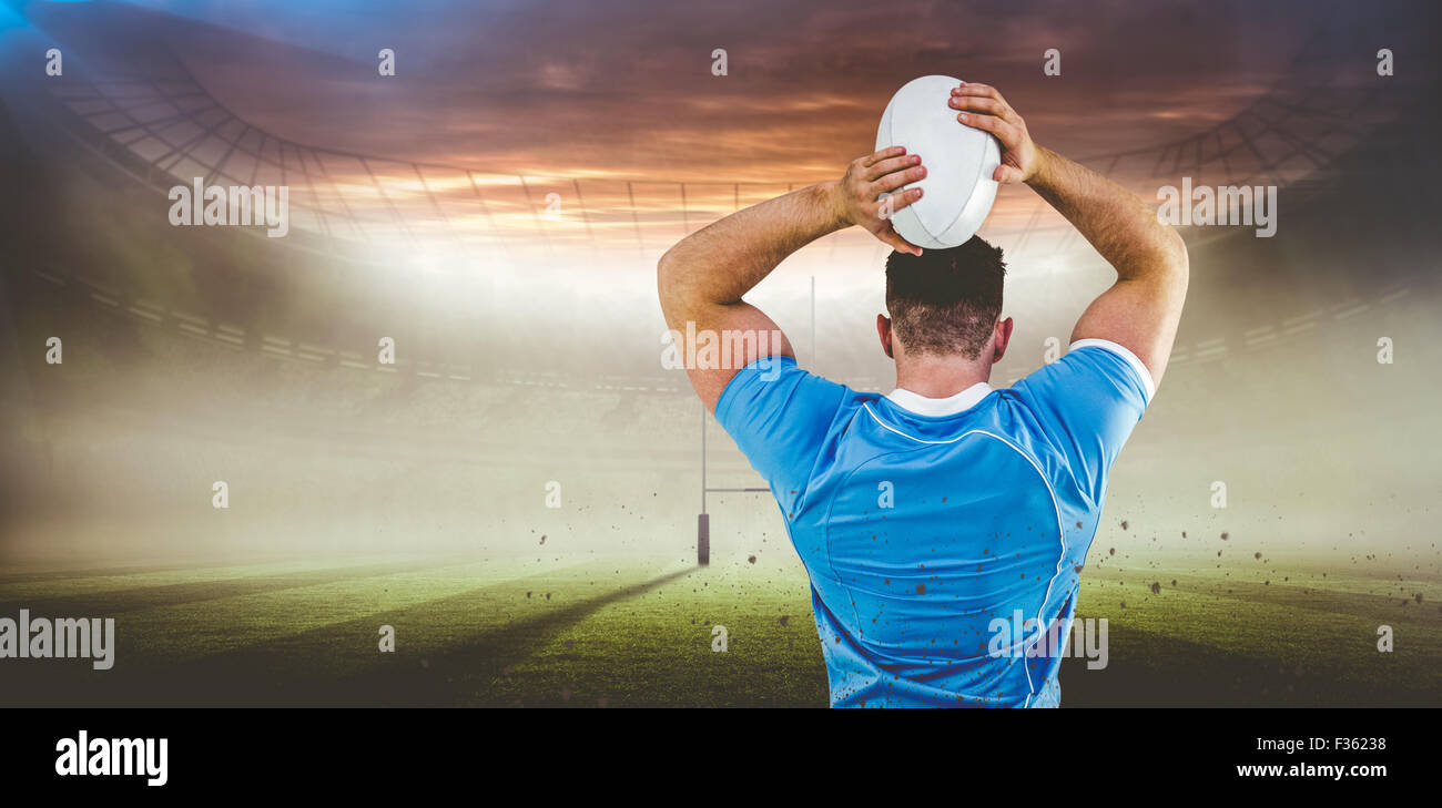 Composite image of rugby player throwing the ball Stock Photo - Alamy