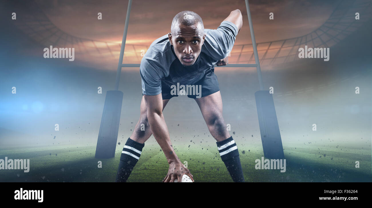 Composite image of portrait of sportsman playing rugby Stock Photo - Alamy