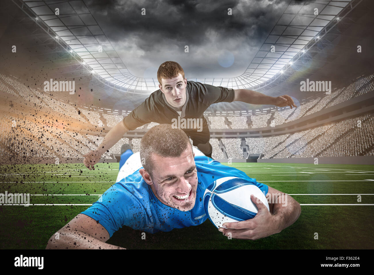 Composite image of confident rugby player lying in front with ball ...