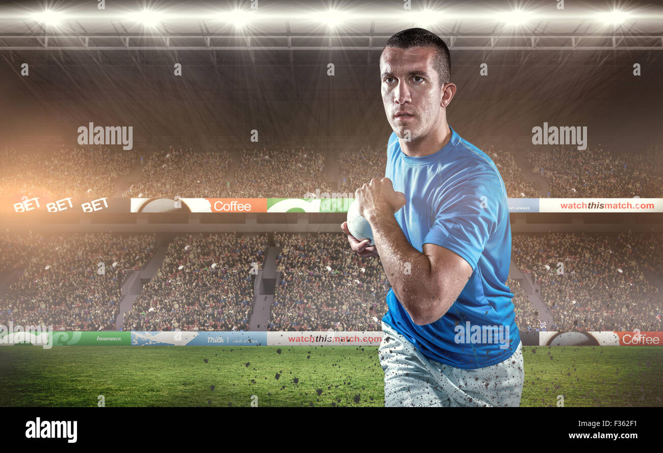 Composite image of rugby player running with ball Stock Photo - Alamy